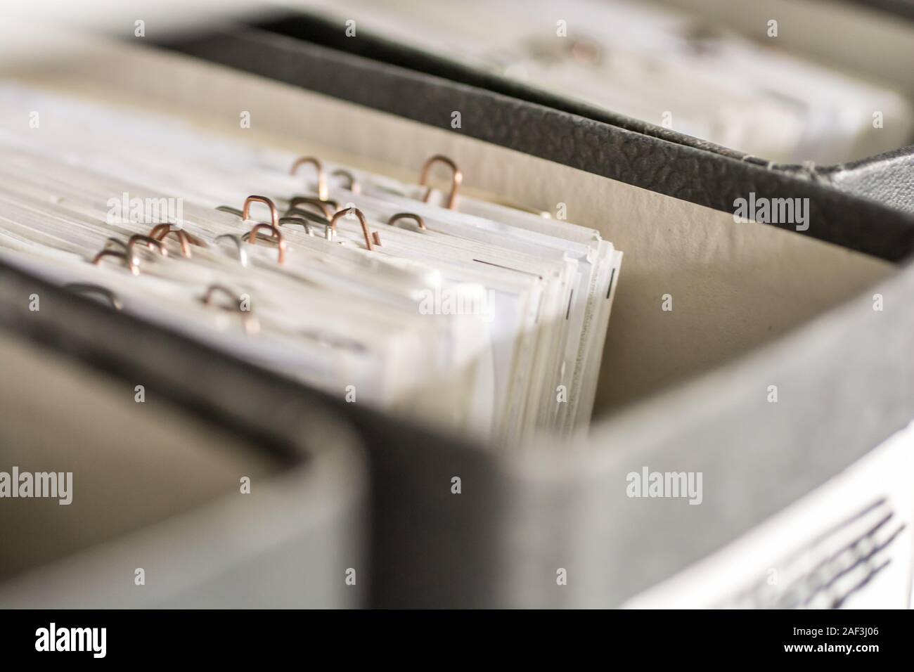 File folder full of paper assembled from paper clips Stock Photo - Alamy