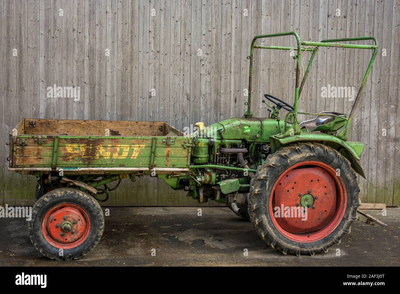Old transport with cargo area on a farm Stock Photo - Alamy