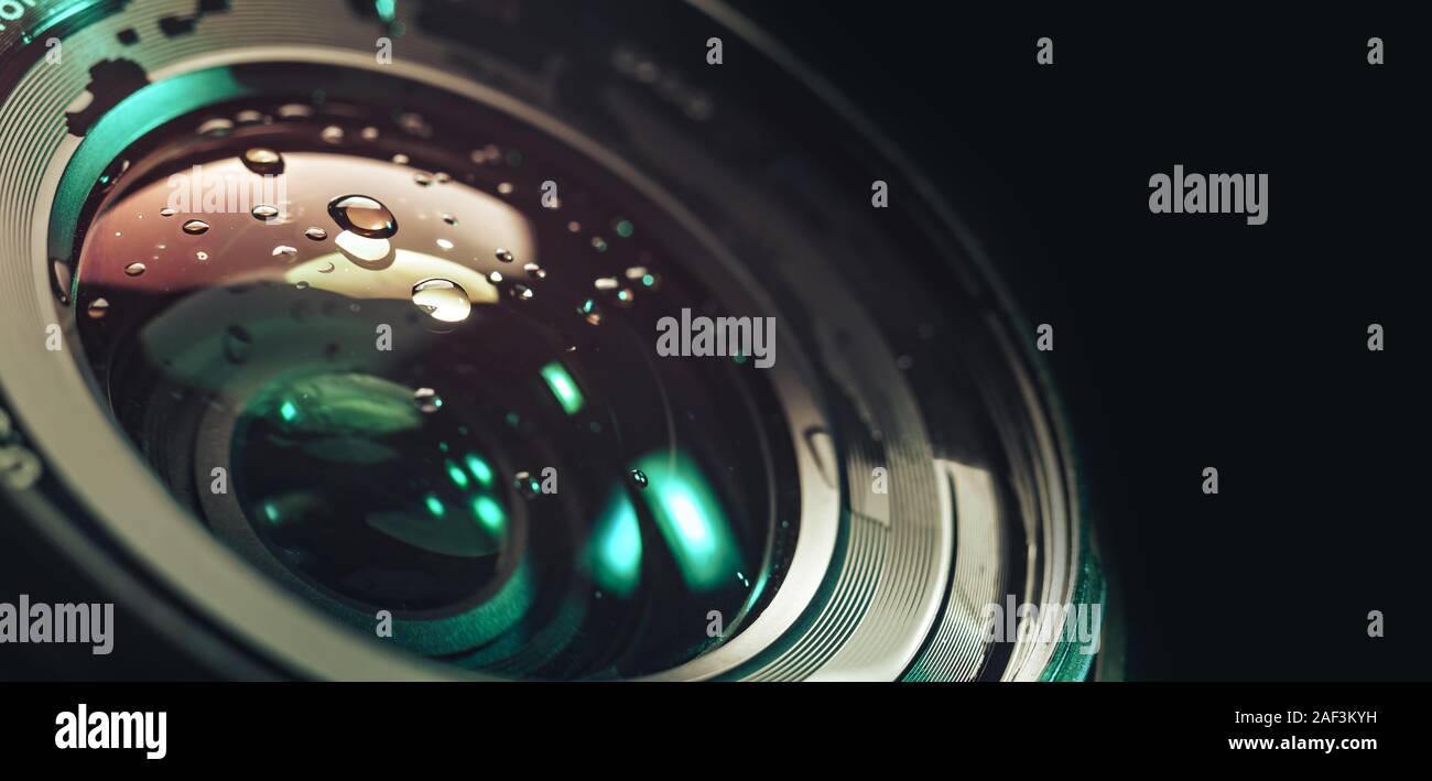 Close up beautiful Camera lens of drop water, aqua menthe light on a ...