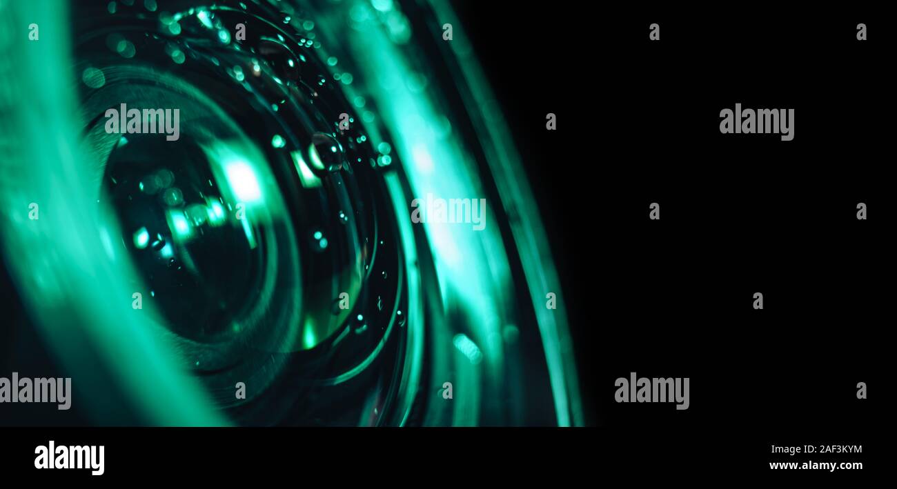 Close up beautiful Camera lens of drop water, aqua menthe light on a ...