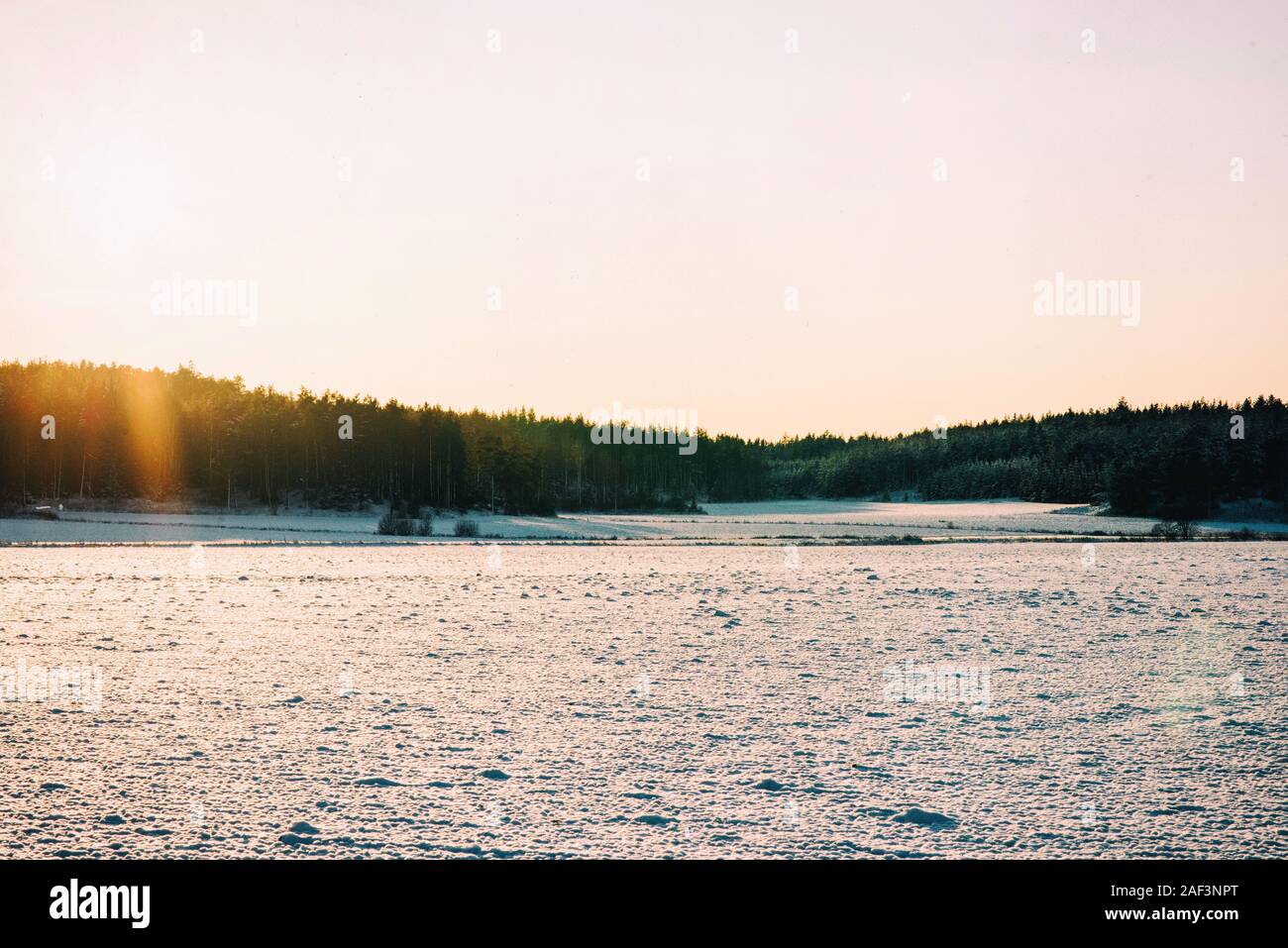 Field snow sunset hi-res stock photography and images - Alamy