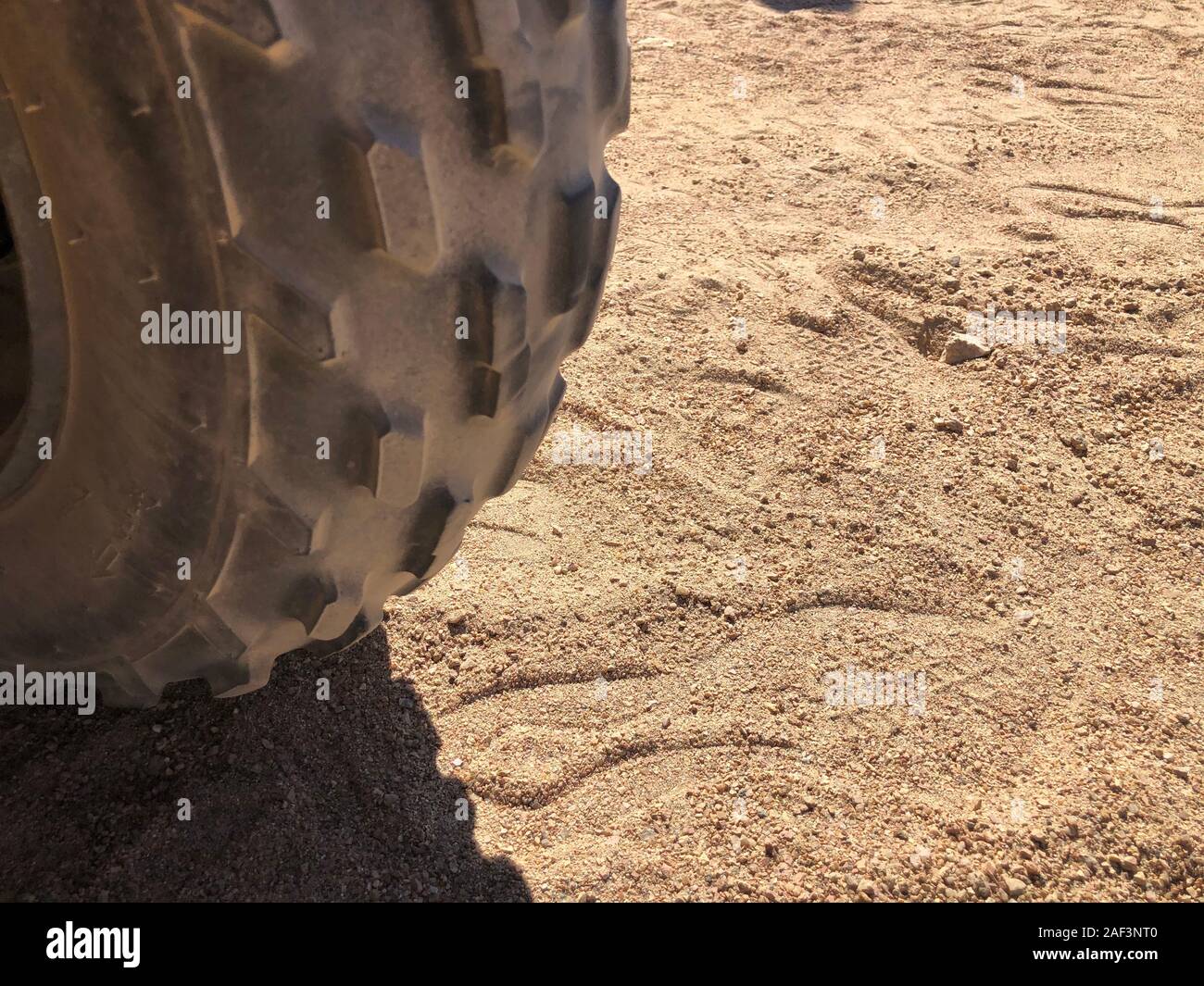Elements of a motobike for tourist adventures in the desert. Tire with ...