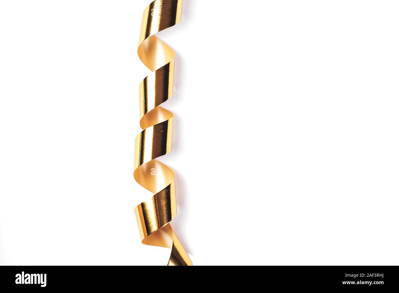 Hanging gold party ribbon confetti hi-res stock photography and images ...