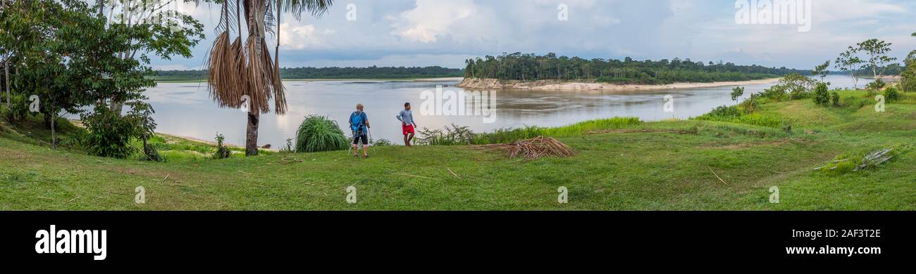 Sunset at the Javari River, the tributary of the Amazon River, Amazonia ...