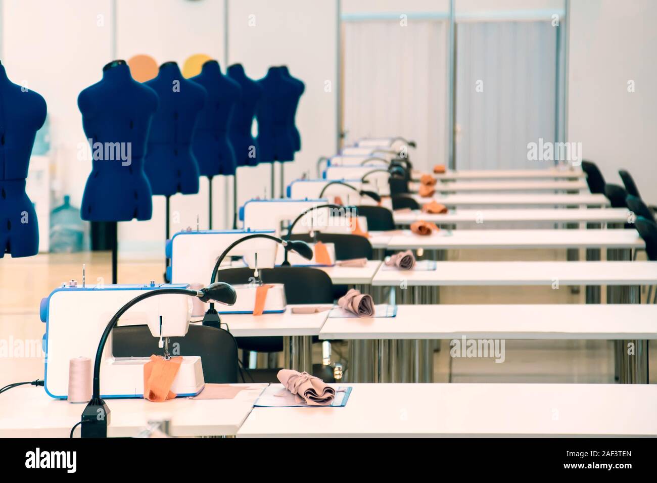 Interior of garment factory shop. Tailoring industry Stock Photo - Alamy