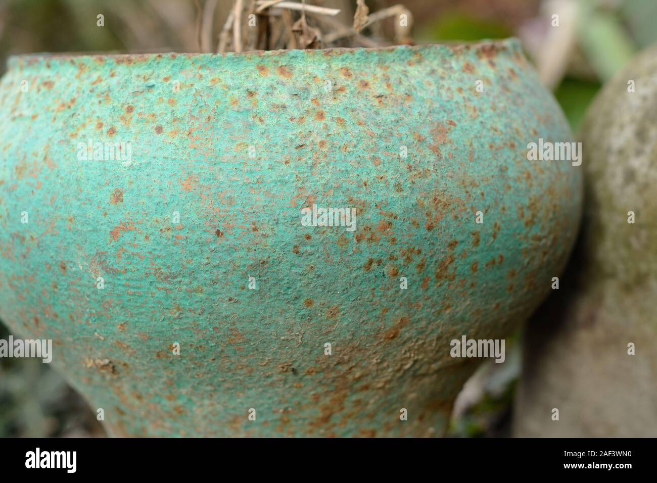 Old cast iron jug, standing in the yard for decoration. 2019 Stock ...