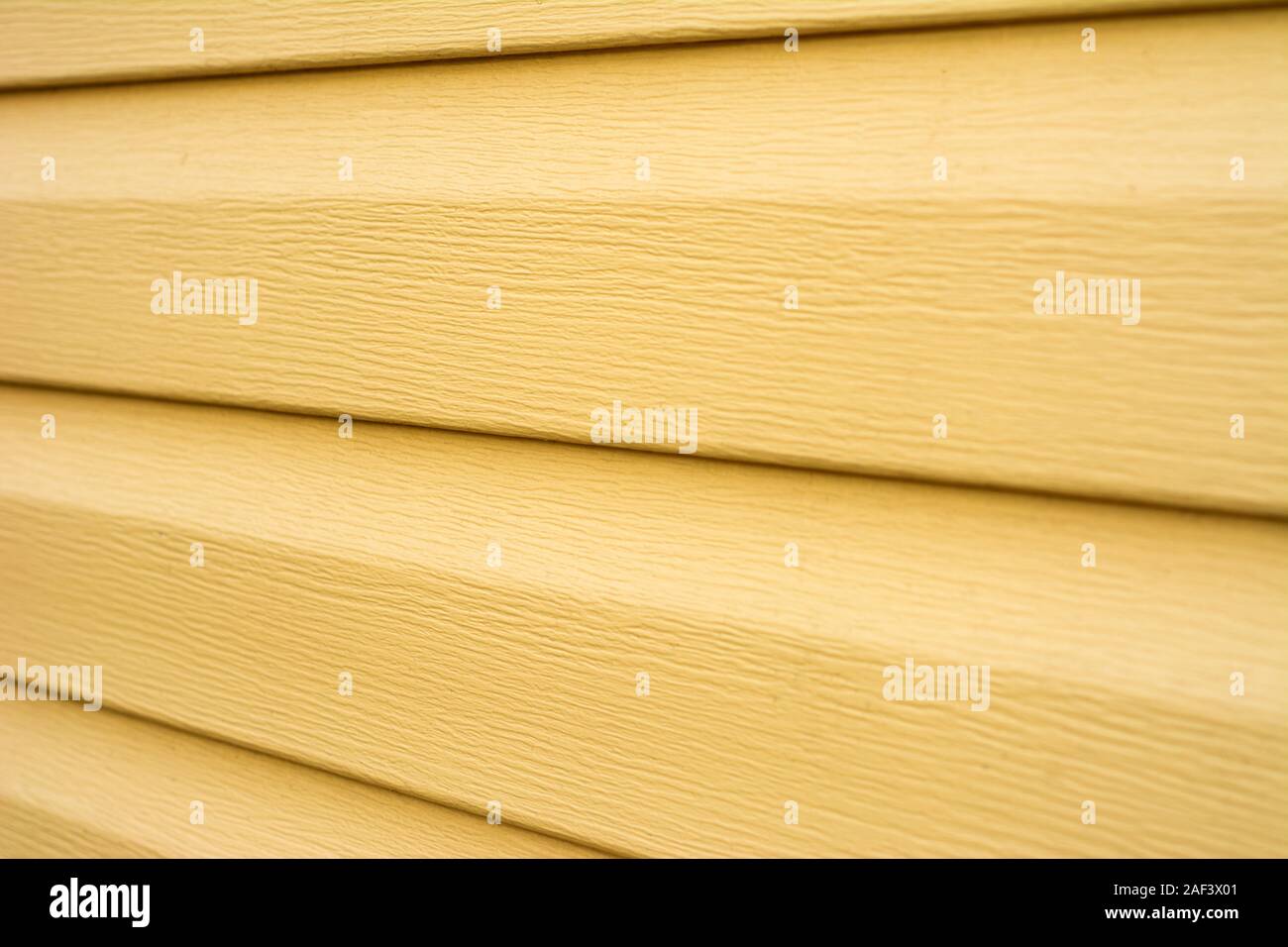 Soft yellow siding, texture and horizontal plastic background. 2019 ...
