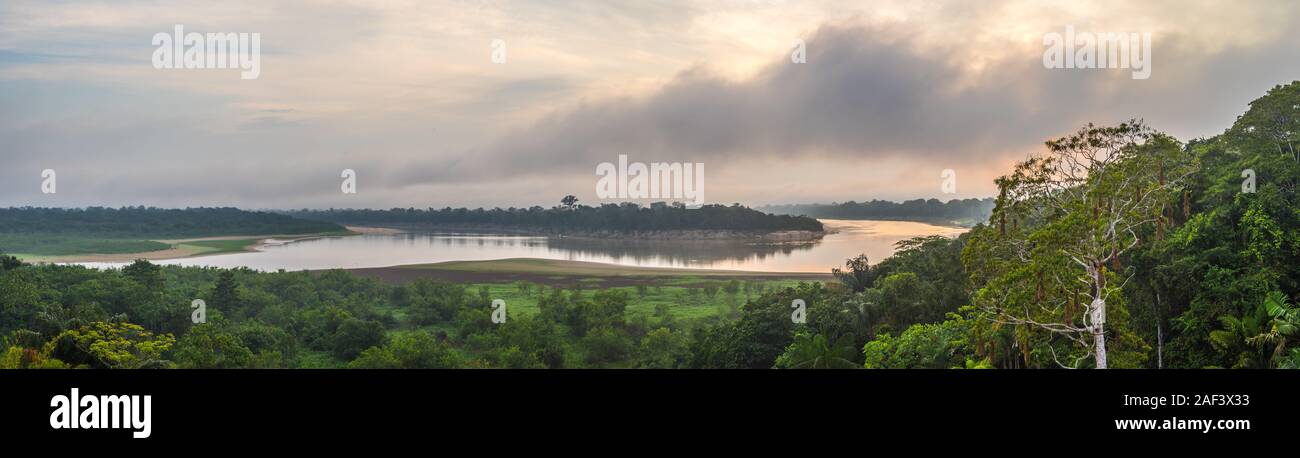 Sunset at the Javari River, the tributary of the Amazon River, Amazonia ...