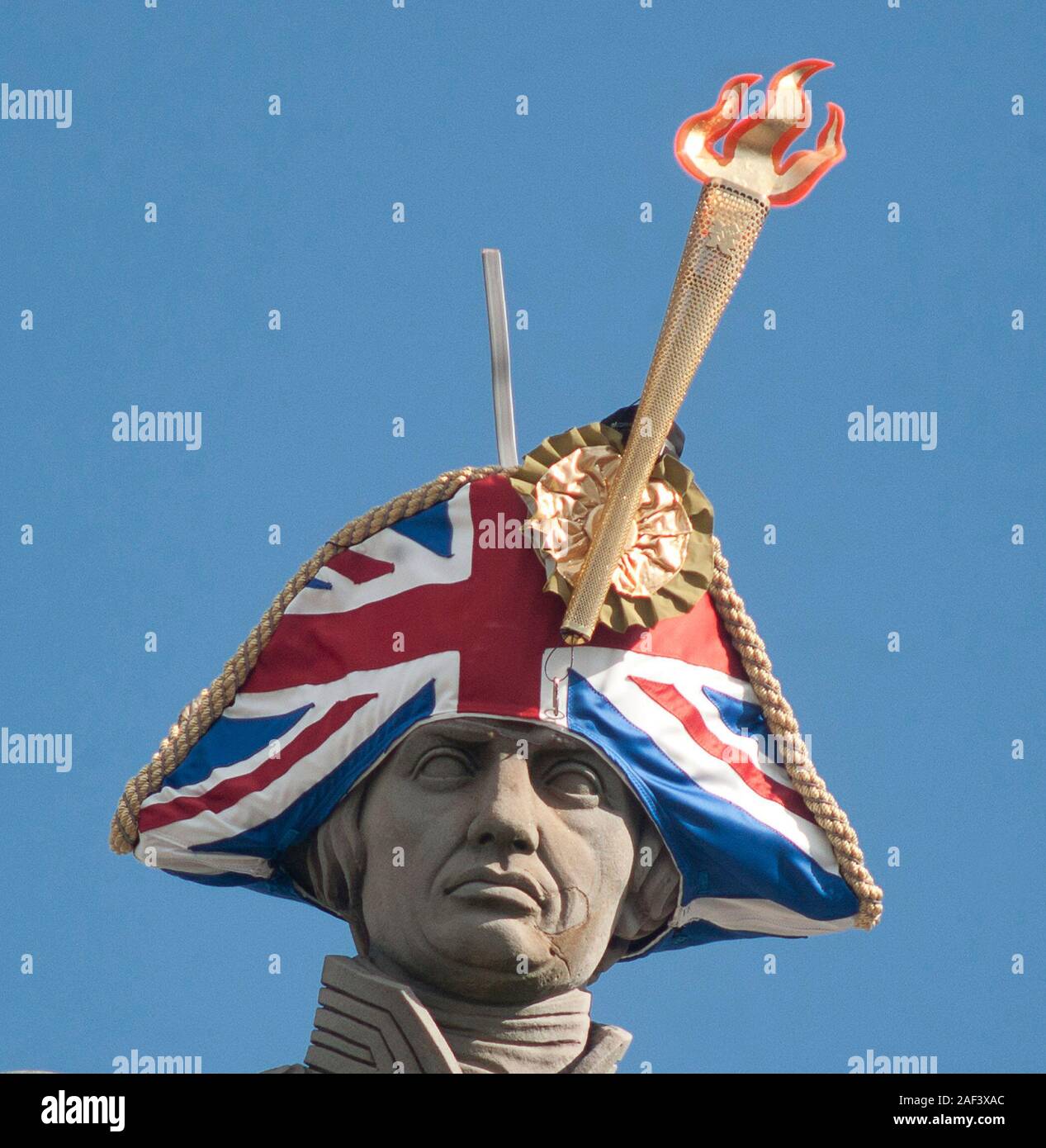 The Statue of King George 1V alongside Admiral Lord Nelson wearing hats ...