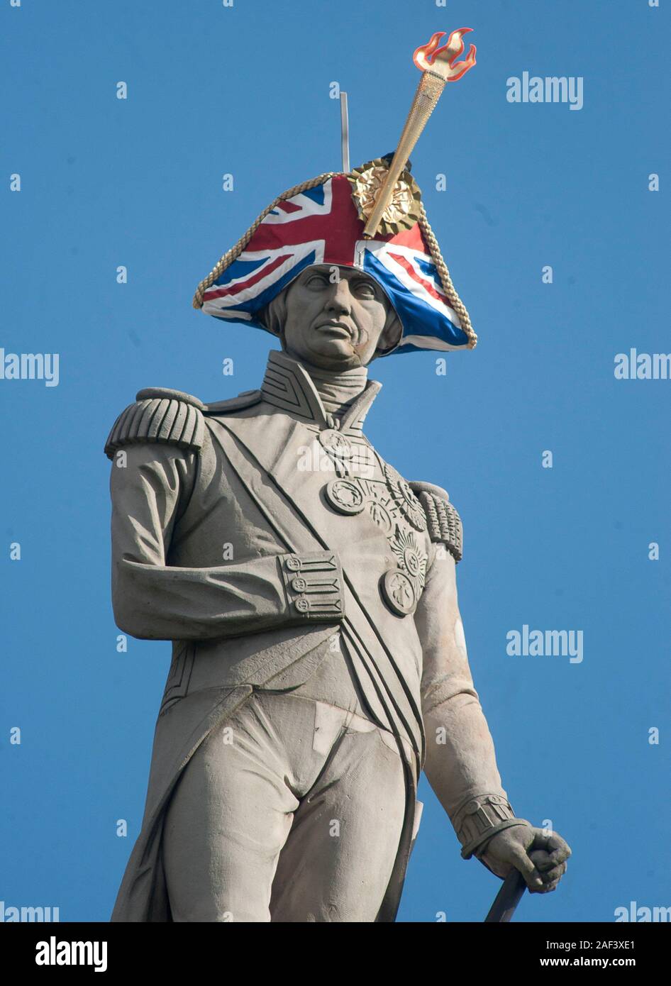 The Statue of King George 1V alongside Admiral Lord Nelson wearing hats ...
