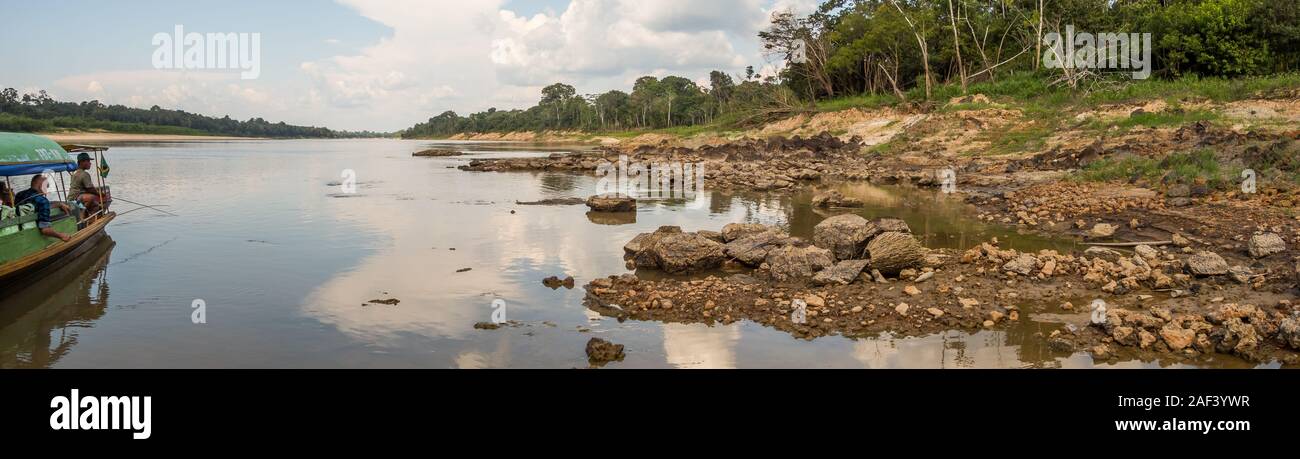 Stony bank of the Javari River, the tributary of the Amazon River ...