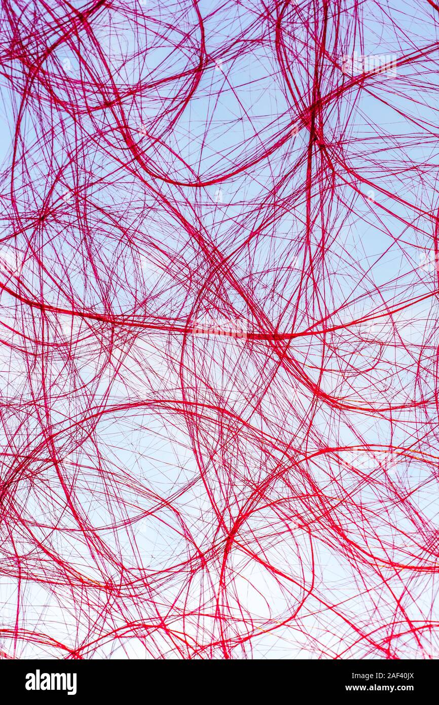 Abstract background with red threads on blue background Stock Photo - Alamy