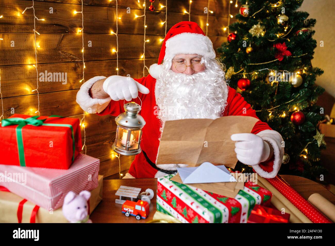 Santa Reading Letter High Resolution Stock Photography and Images - Alamy
