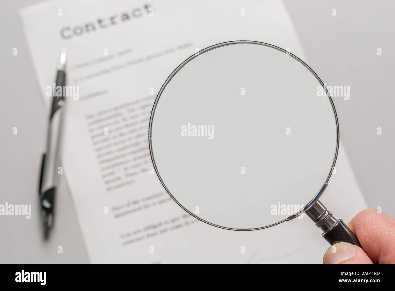 Contract with empty magnifying glass as a template for further ...
