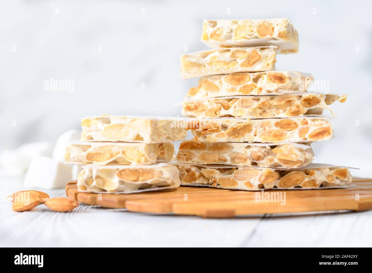 Bunch of spanish almond turron confection Stock Photo - Alamy