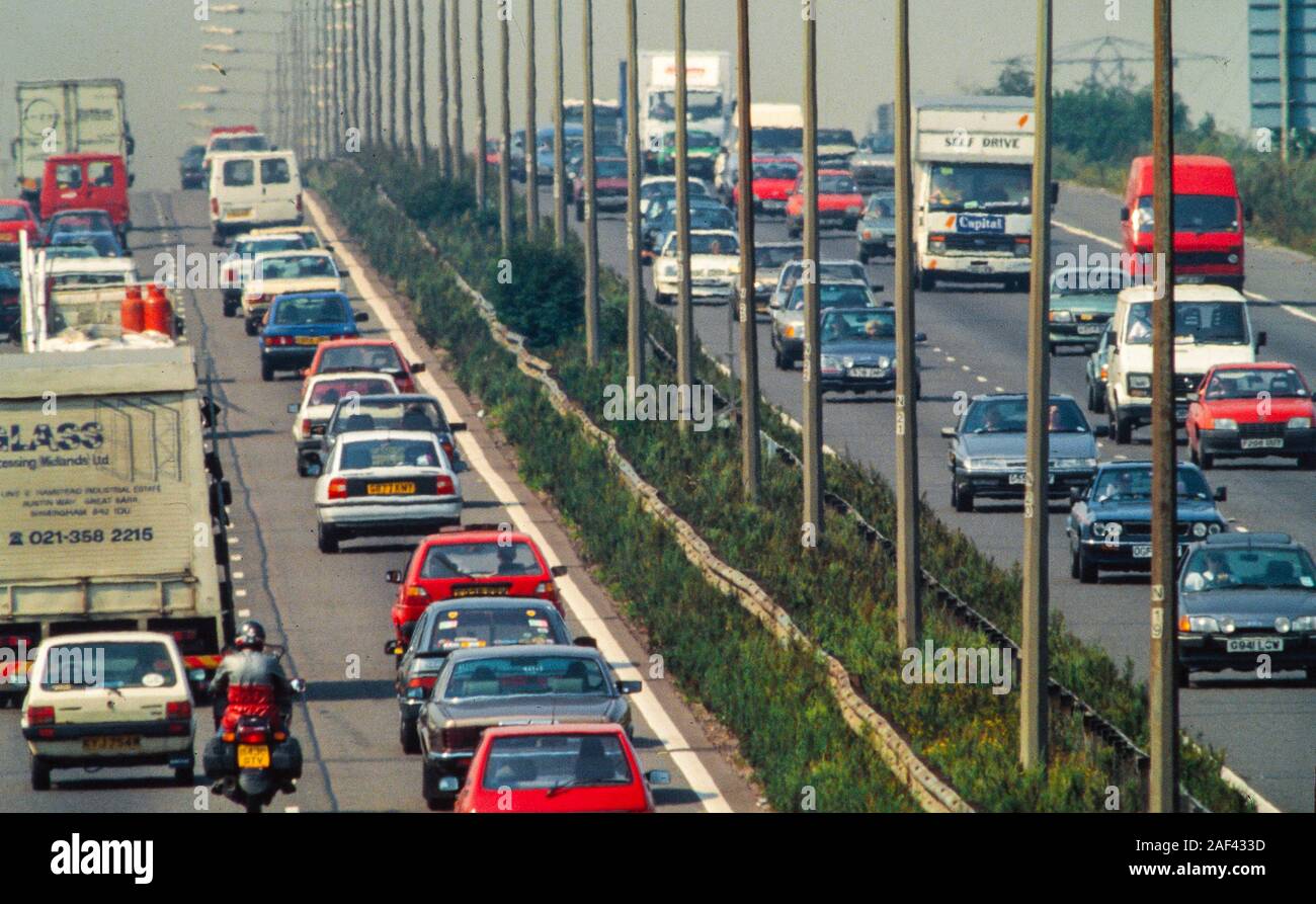 Heavy traffic on a UK motorway, long lens view Stock Photo - Alamy
