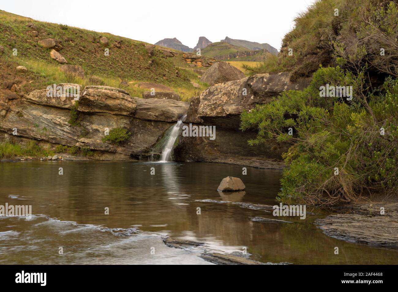 Waterfall and mountain pool Stock Photo - Alamy