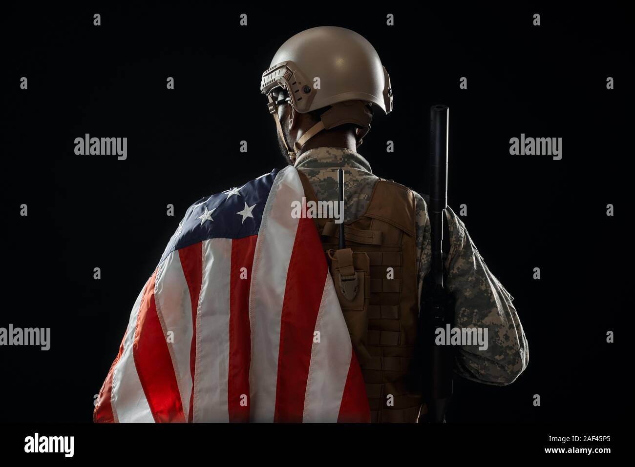 Back view holding gun on shoulder hi-res stock photography and images ...