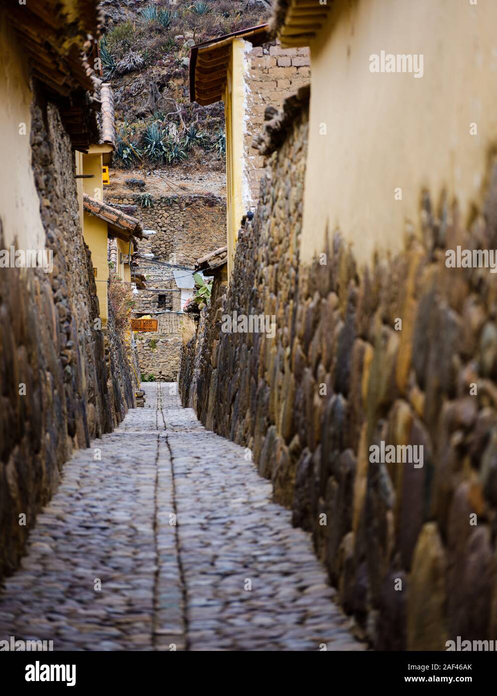 SACRED VALLEY, PERU - CIRCA SEPTEMBER 2019: Typical narrow cobblestone ...