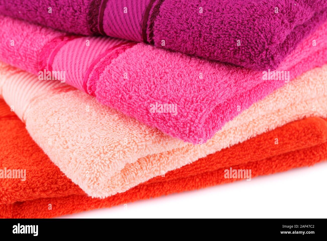 Colorful towels stack closeup picture Stock Photo - Alamy