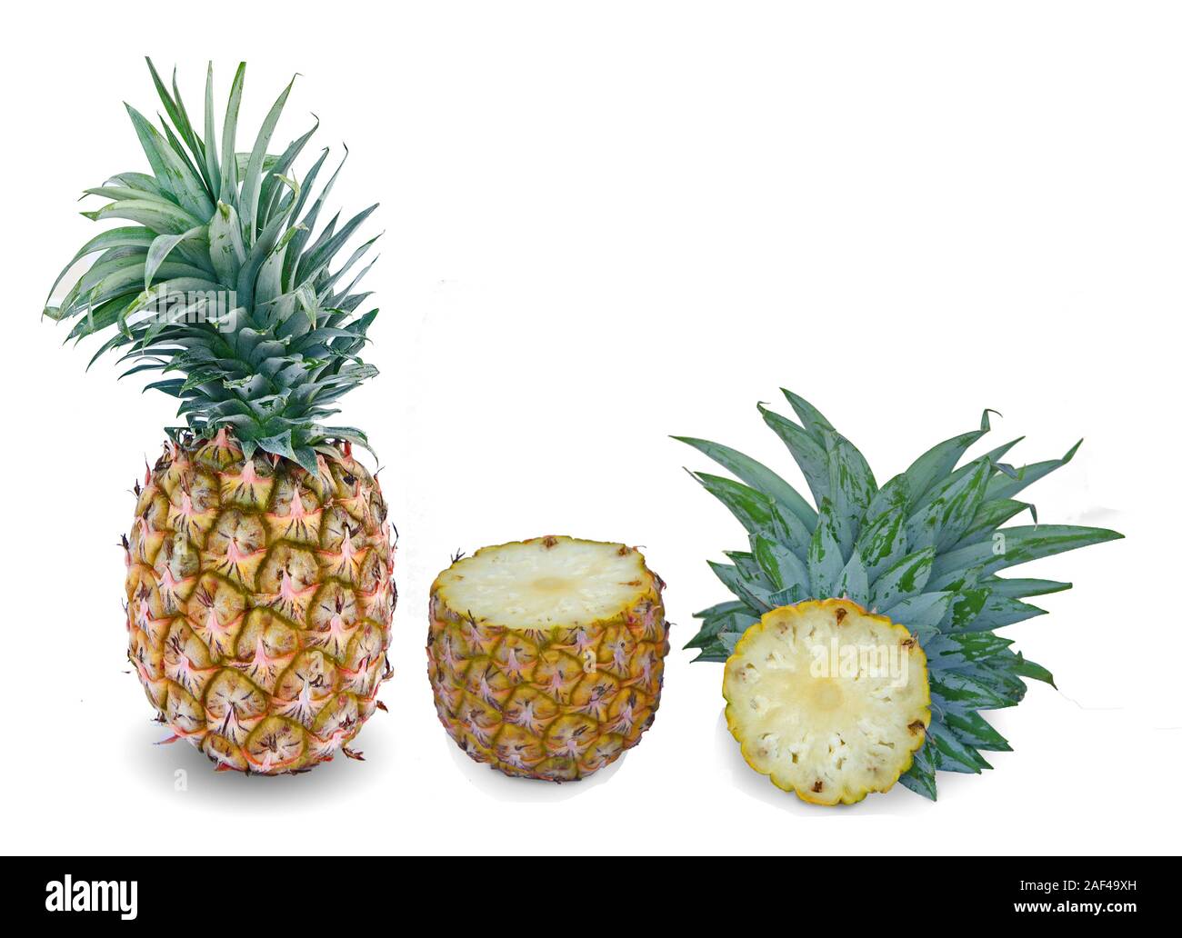 Sections of pineapple isolated on white background Stock Photo - Alamy