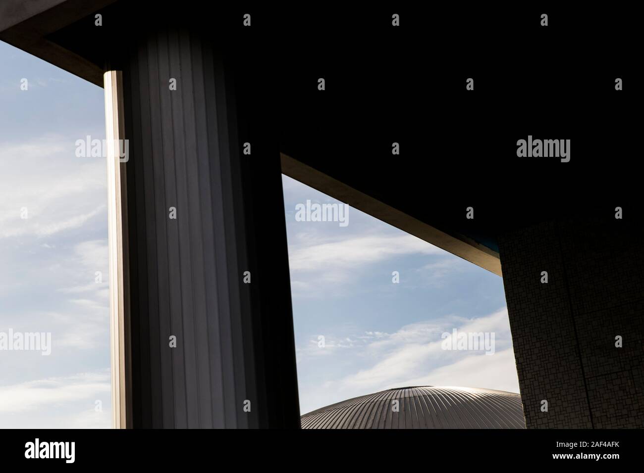 The domed roof of the Berlin Congress Center seen through a pillared ...