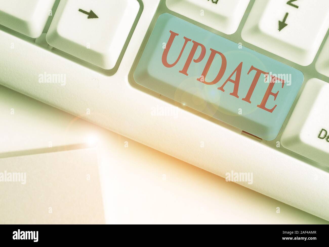 Writing note showing Update. Business concept for make something more modern or up to date like ...