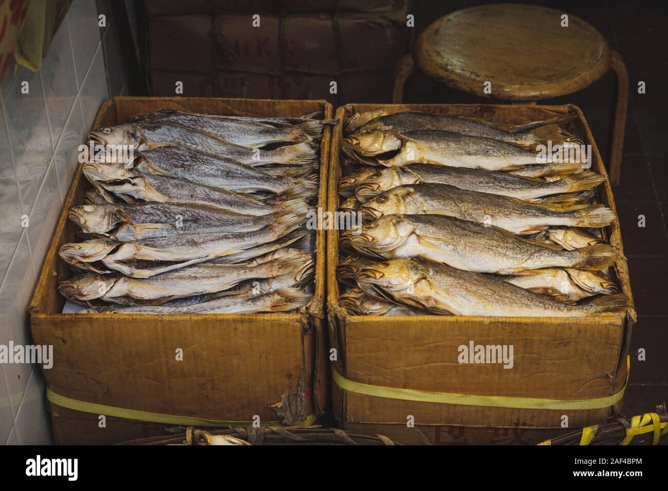 Fishes in boxes, dried fish on street food market Stock Photo - Alamy