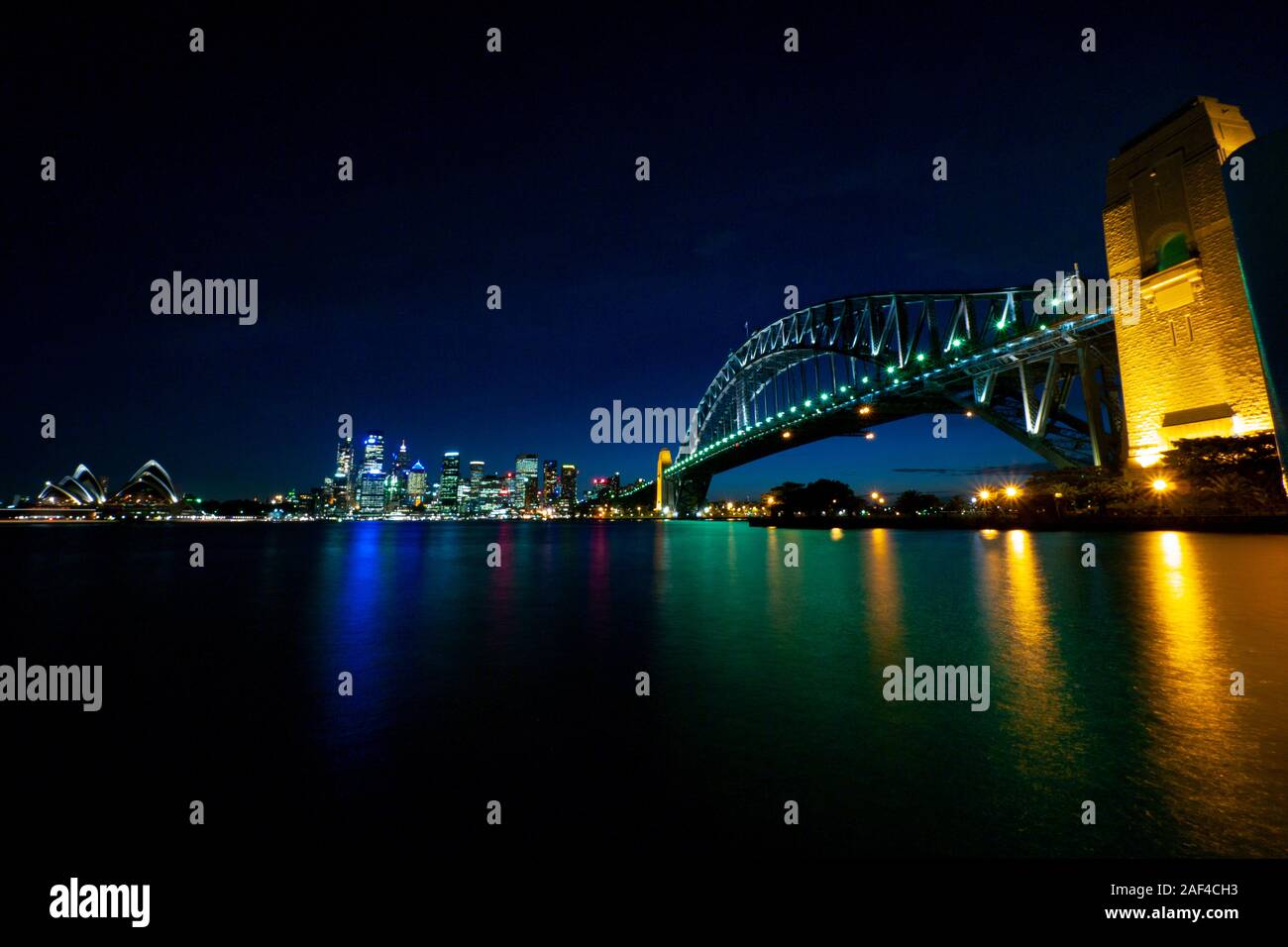 Sydney Harbour Bridge and the Opera House at night, from Jeffrey Street ...