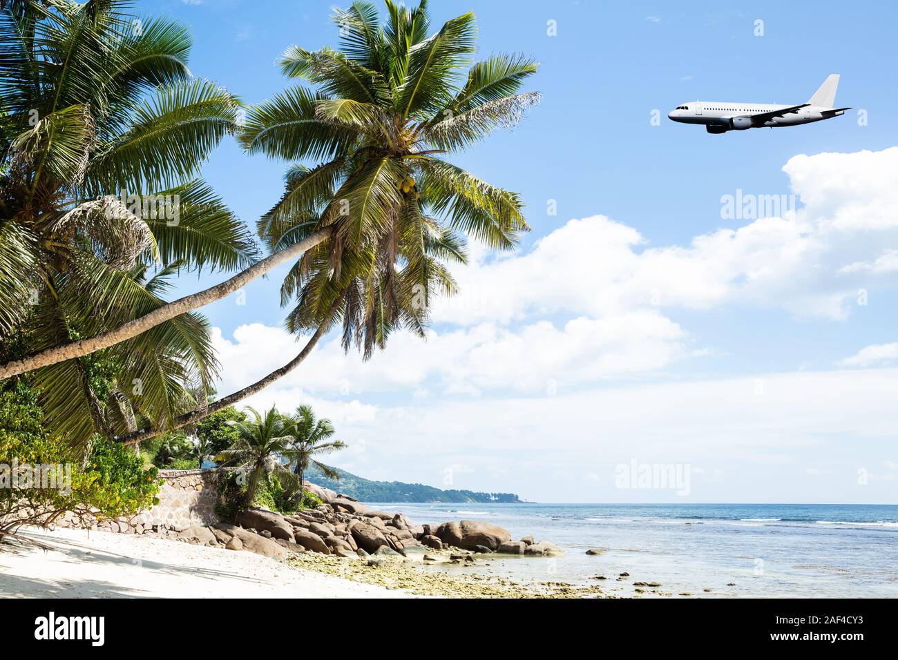 Airplane Is Flying In Cloudy Sky Over Island And Sea In Summer At ...