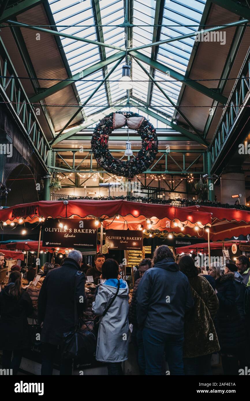 London, UK - November 29, 2019: Christmas wreath above Olivers Bakery ...