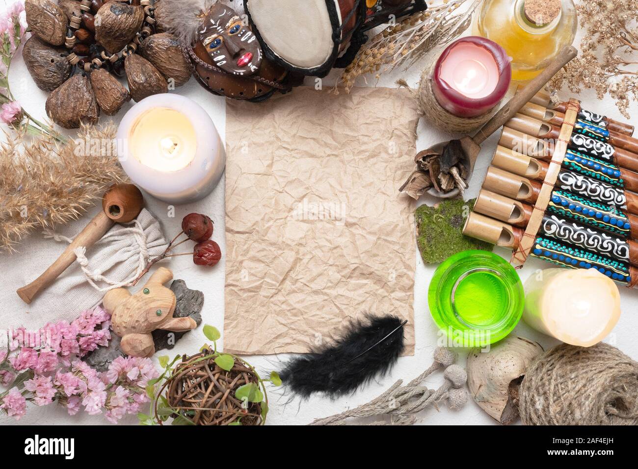 Old magic scroll with copy space and other magical accessories on mage ...