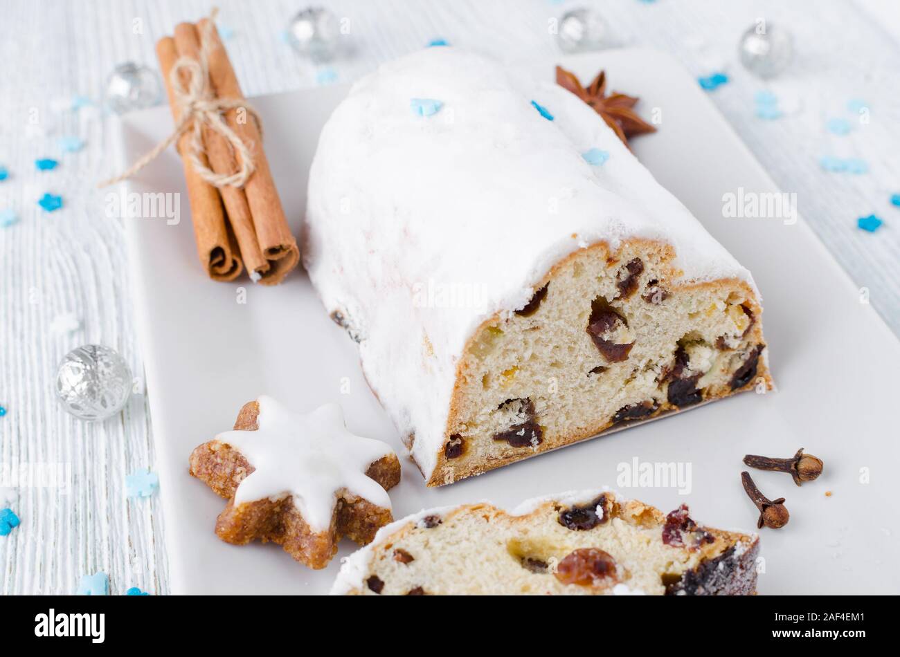 traditional german christmas cake stollen with cookies and decoration ...