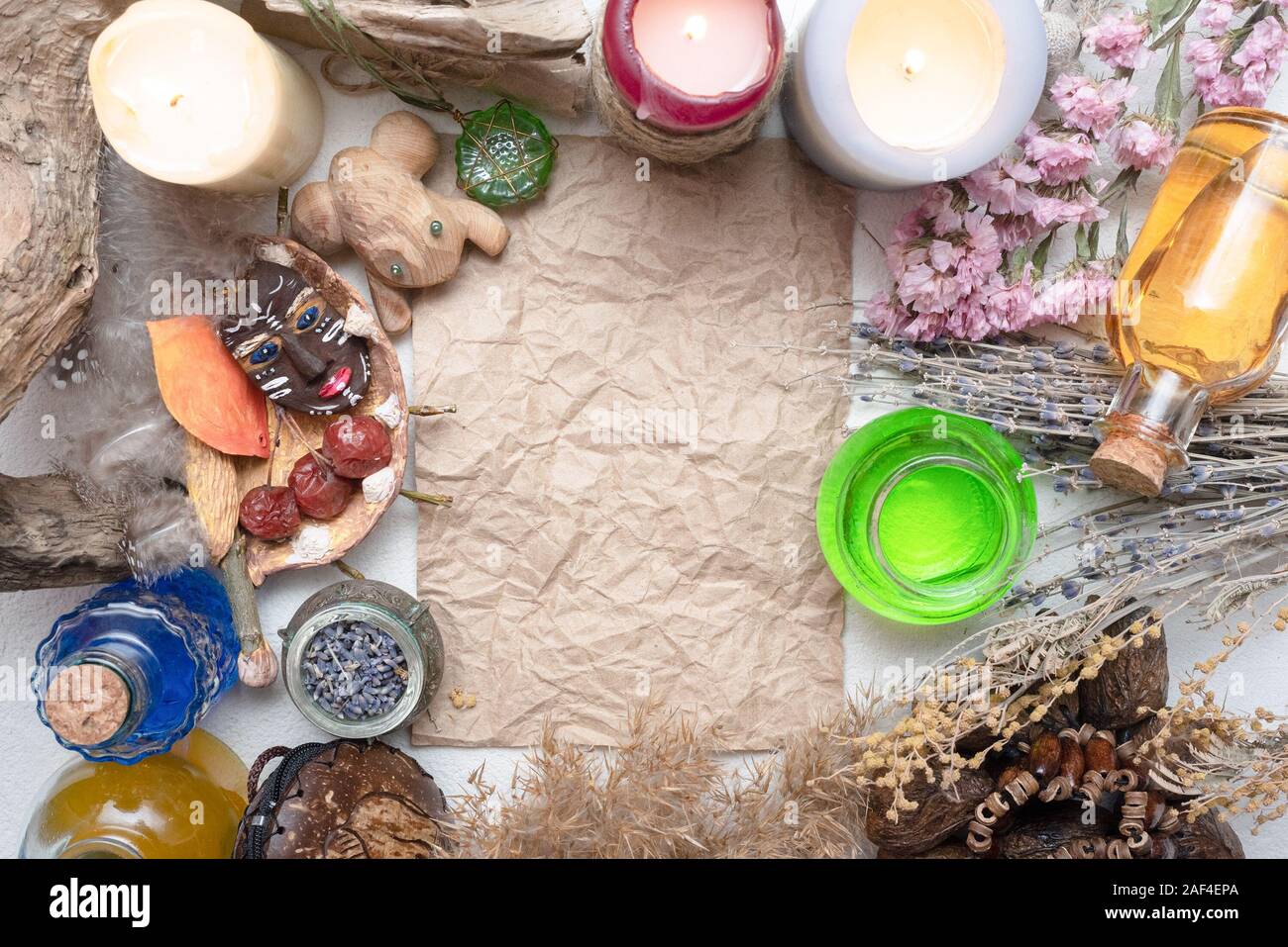 Old magic scroll with copy space and other magical accessories on mage ...