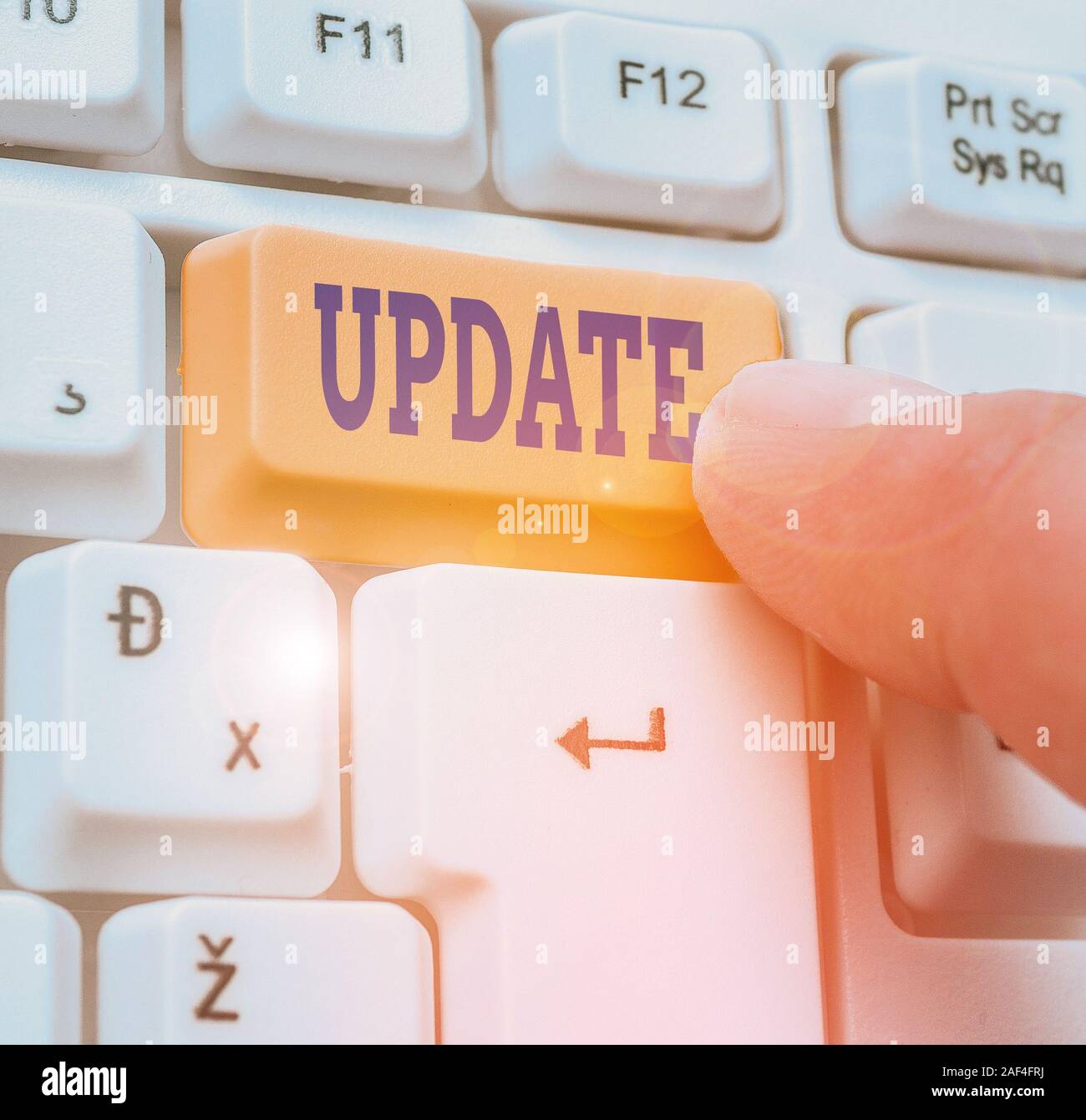 Conceptual hand writing showing Update. Concept meaning make something more modern or up to date ...