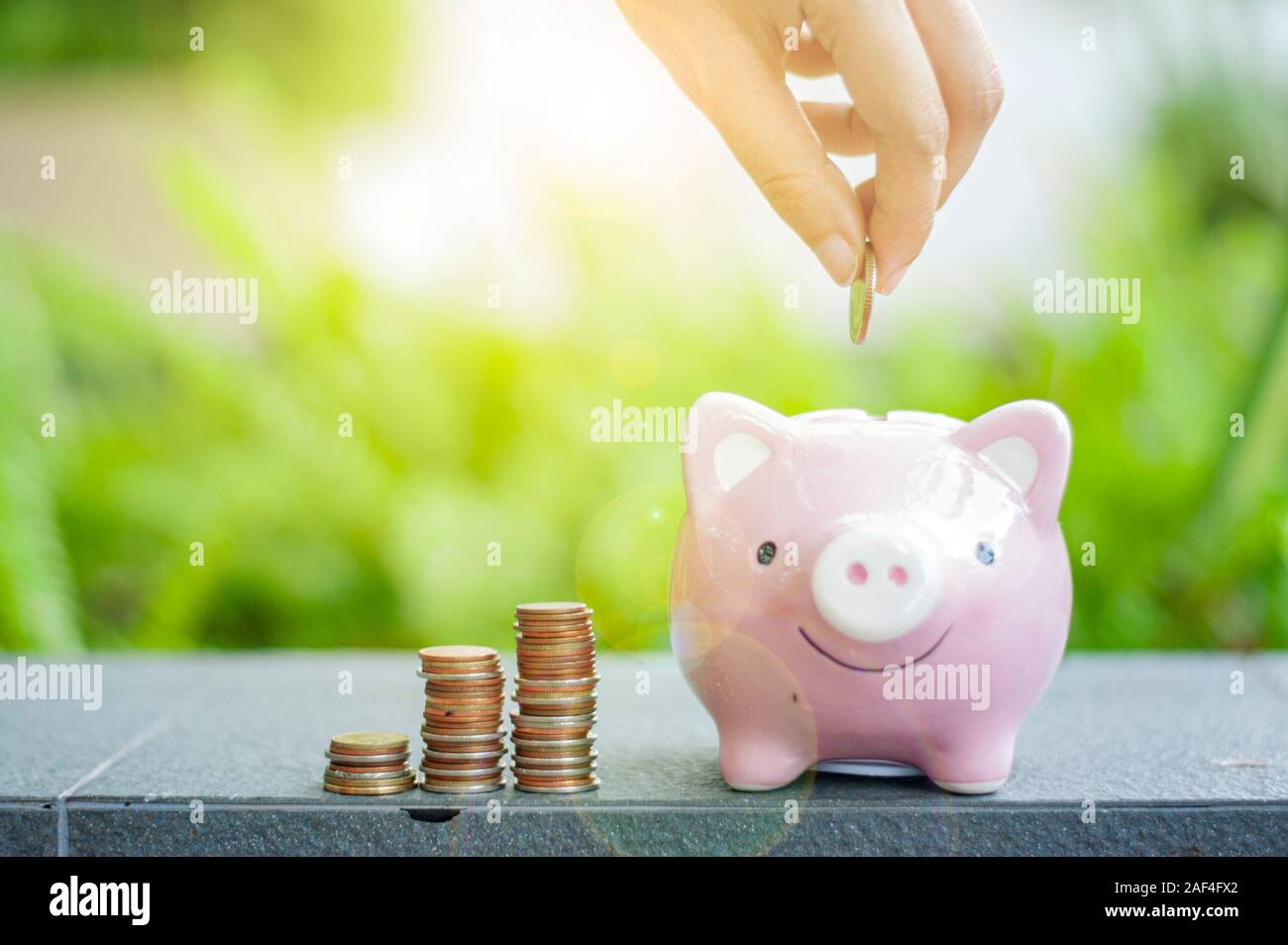 Saving money for future business Stock Photo - Alamy