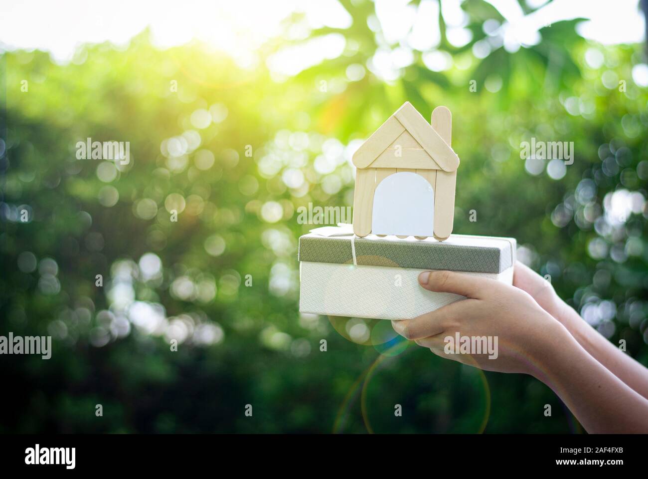 Giving the house as a gift Stock Photo - Alamy