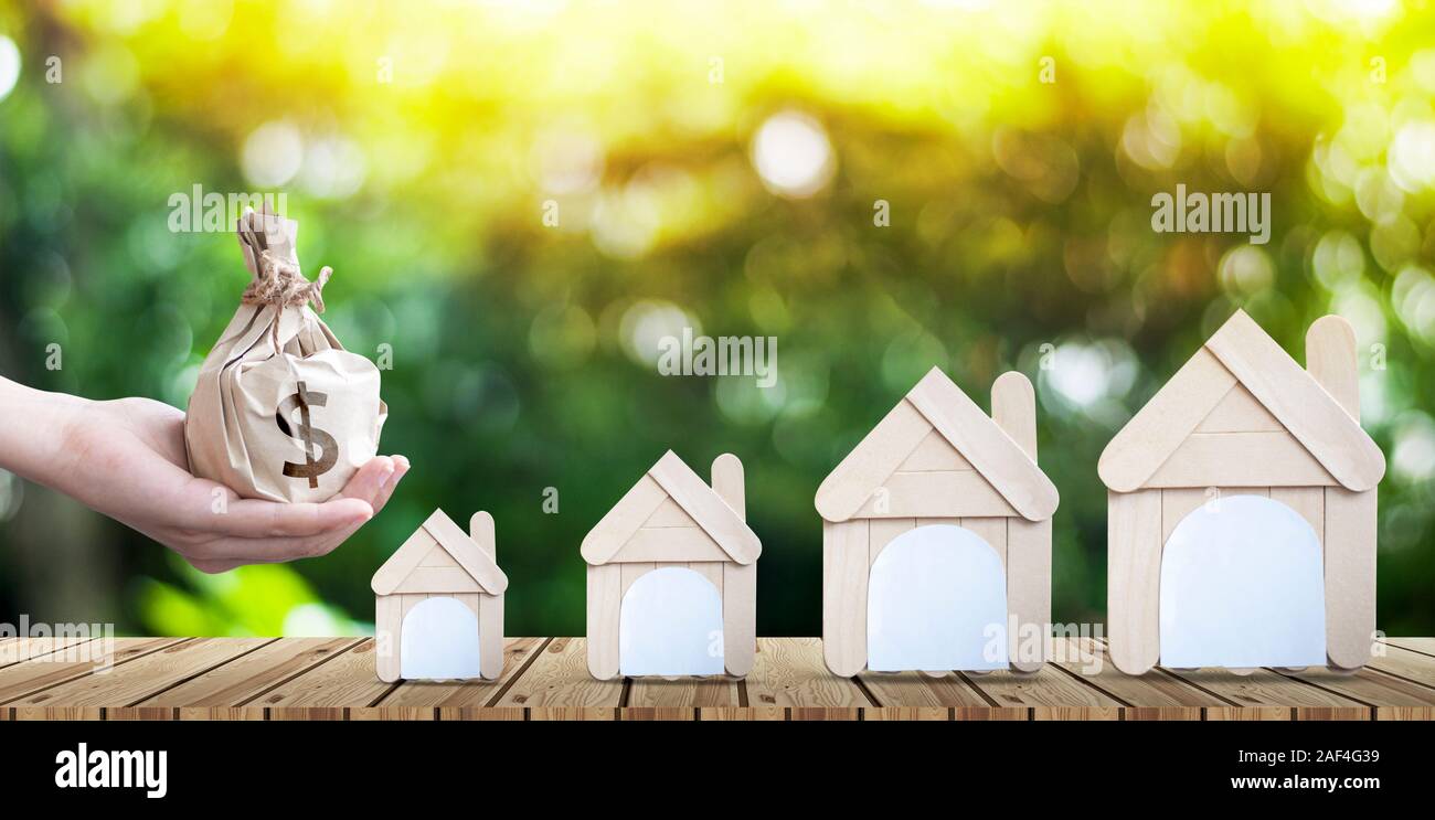 Saving money to buy a house in the future Real estate concept Stock ...