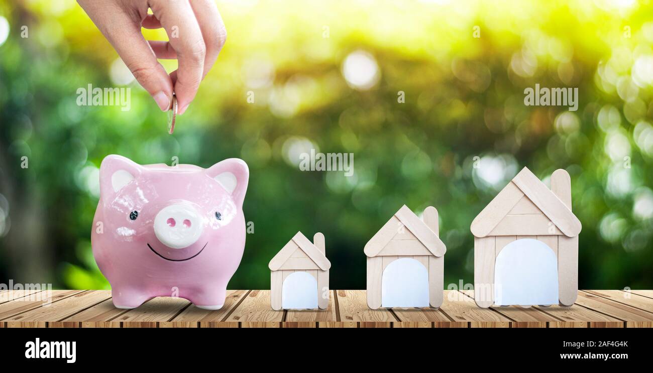 Saving money to buy a house in the future Real estate concept Stock ...