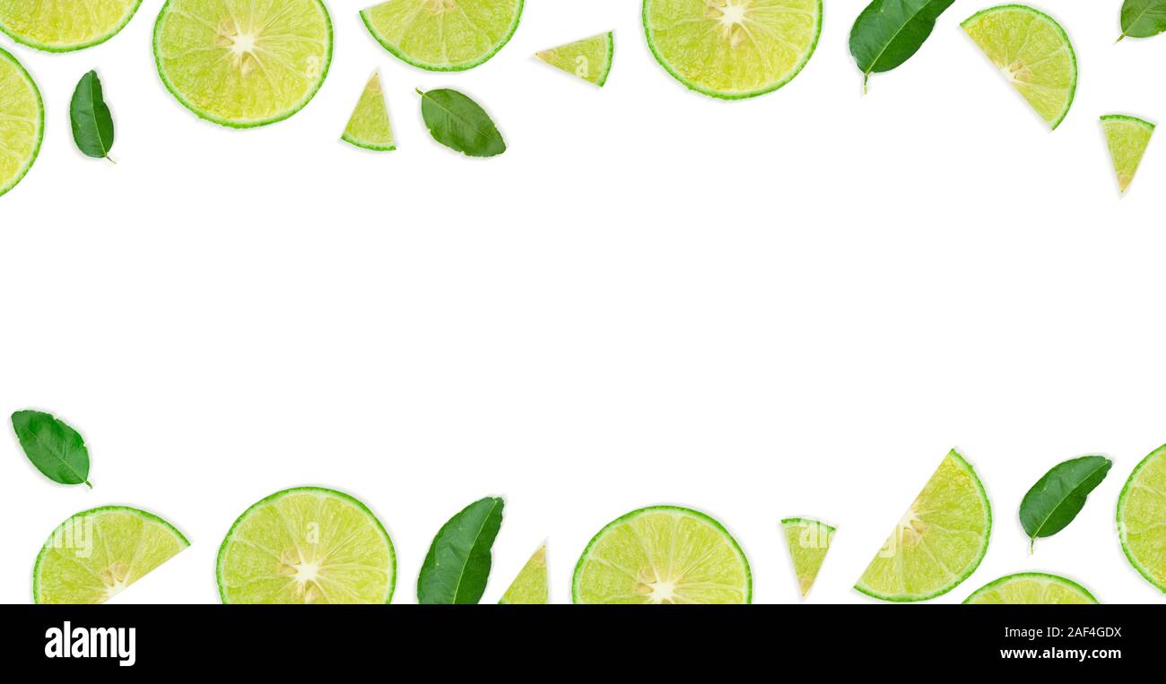Lime slices isolated on white background Stock Photo - Alamy