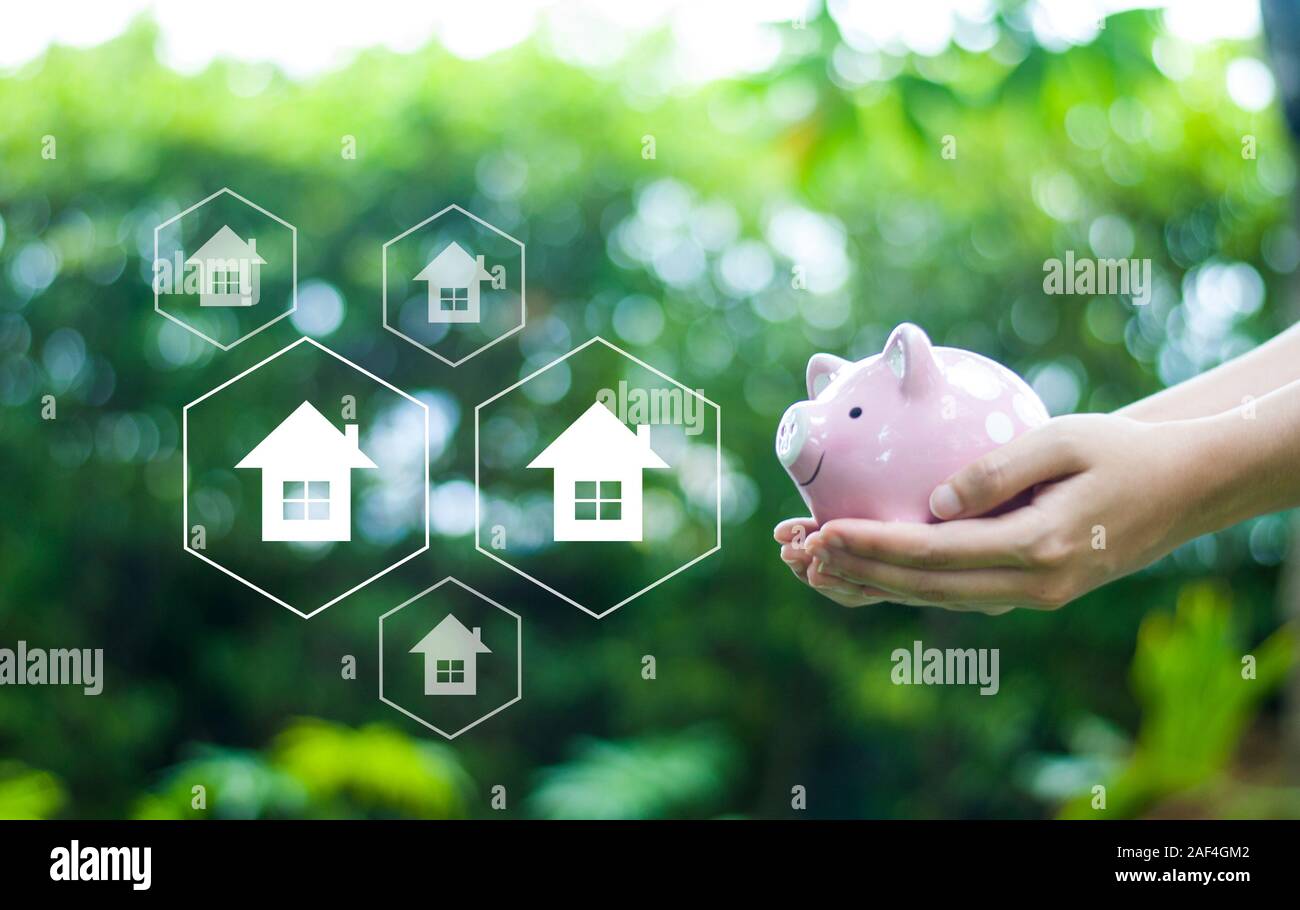 Saving money to buy a house in the future Real estate concept Stock ...