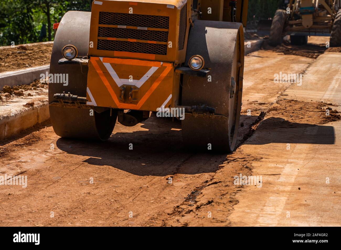 Road rollers working on the new roads construction site. Heavy duty ...