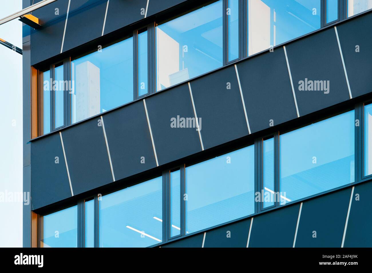 Windows of modern corporate business office building Stock Photo - Alamy