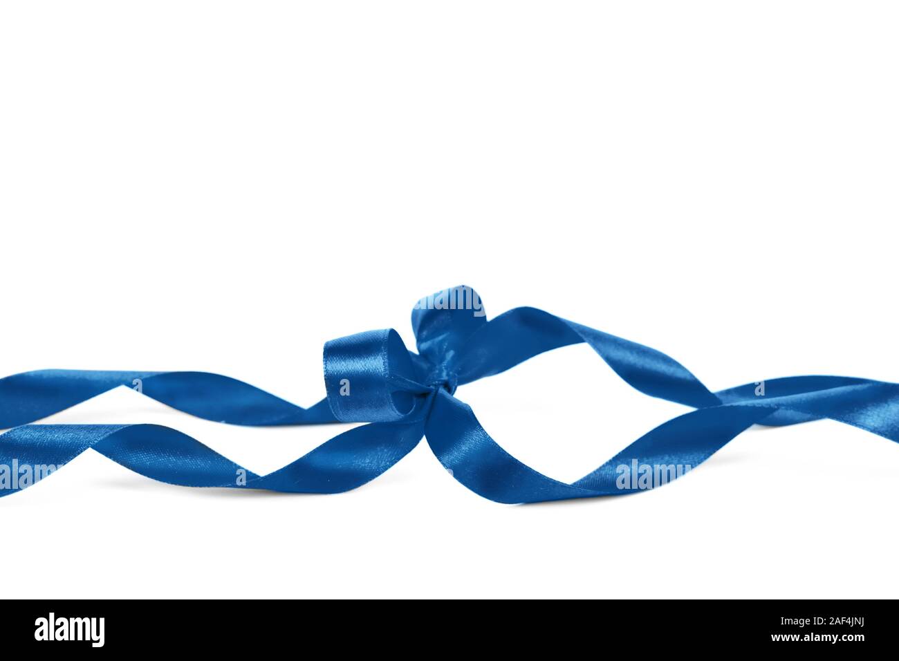 Beautiful decorative shiny trendy blue silk ribbon with a bow on ...