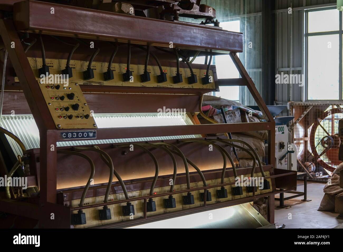 Ramboda, Sri Lanka - May 07, 2018: The work of the machine sorting tea ...