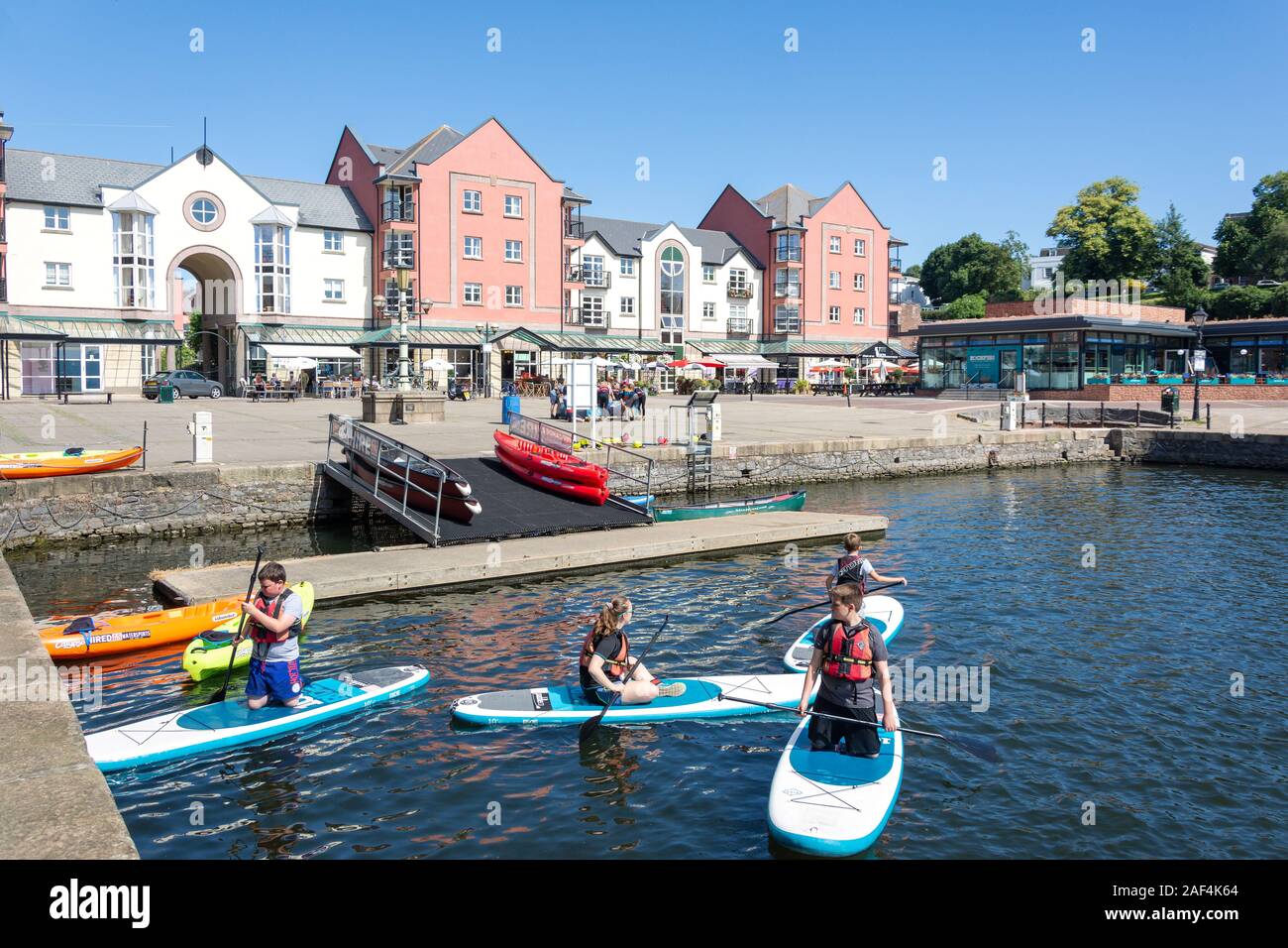 Children riding on paddle boards piazza terracina boarding paddl hi-res ...
