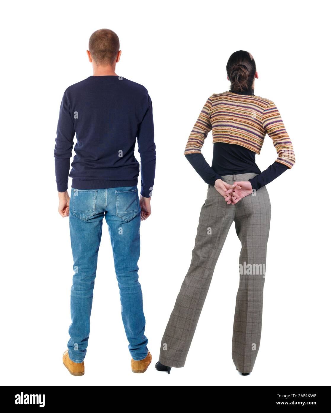 Back view of couple. beautiful friendly girl and guy together. Rear ...