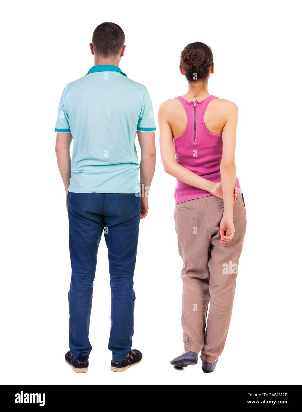 Back view of couple. beautiful friendly girl and guy together. Rear ...