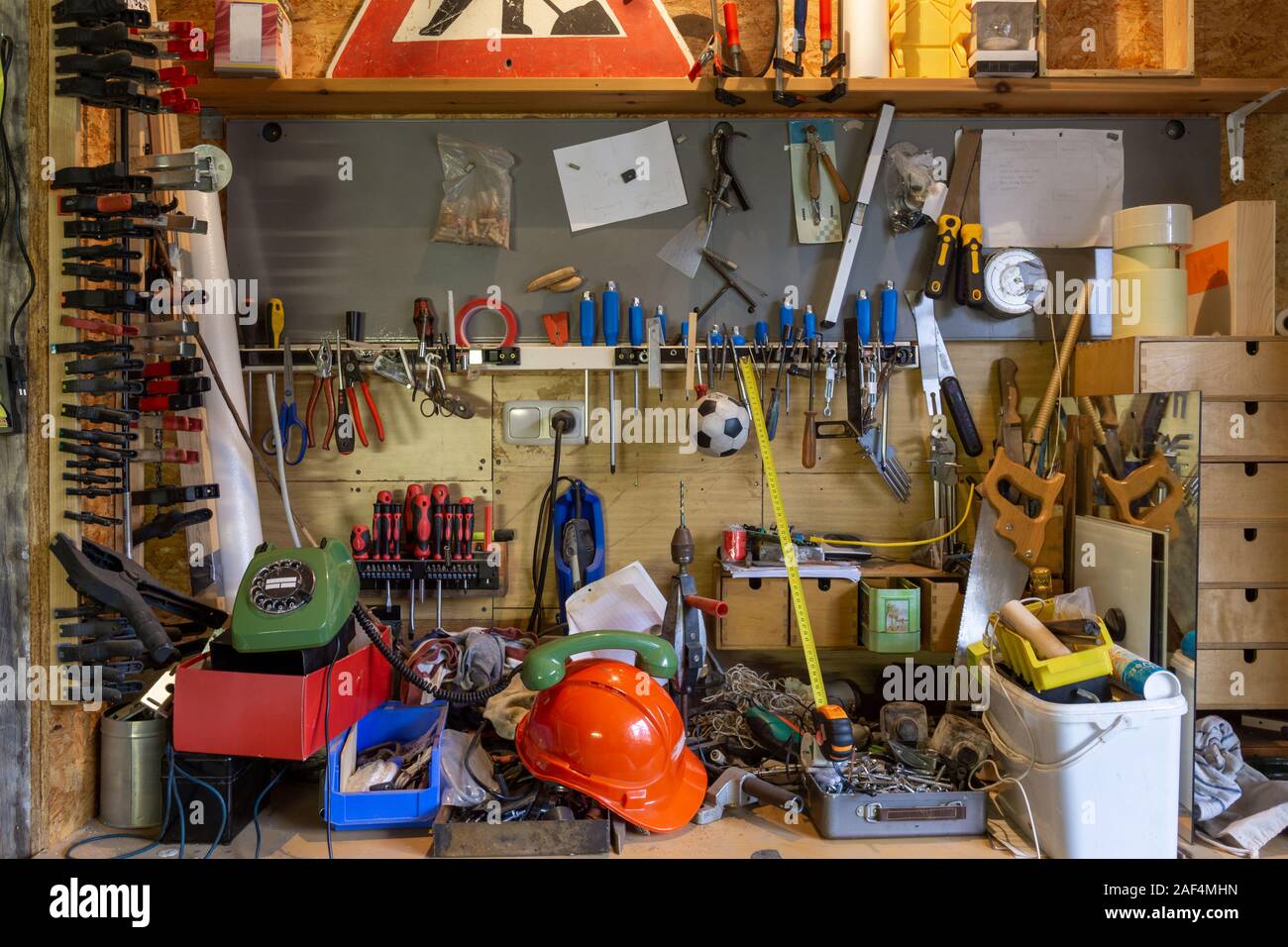 Mess and tools in disorder in a workroom. Equipment, home, interior ...