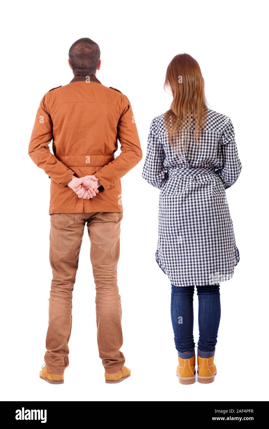 Back view of couple. beautiful friendly girl and guy together. Rear ...